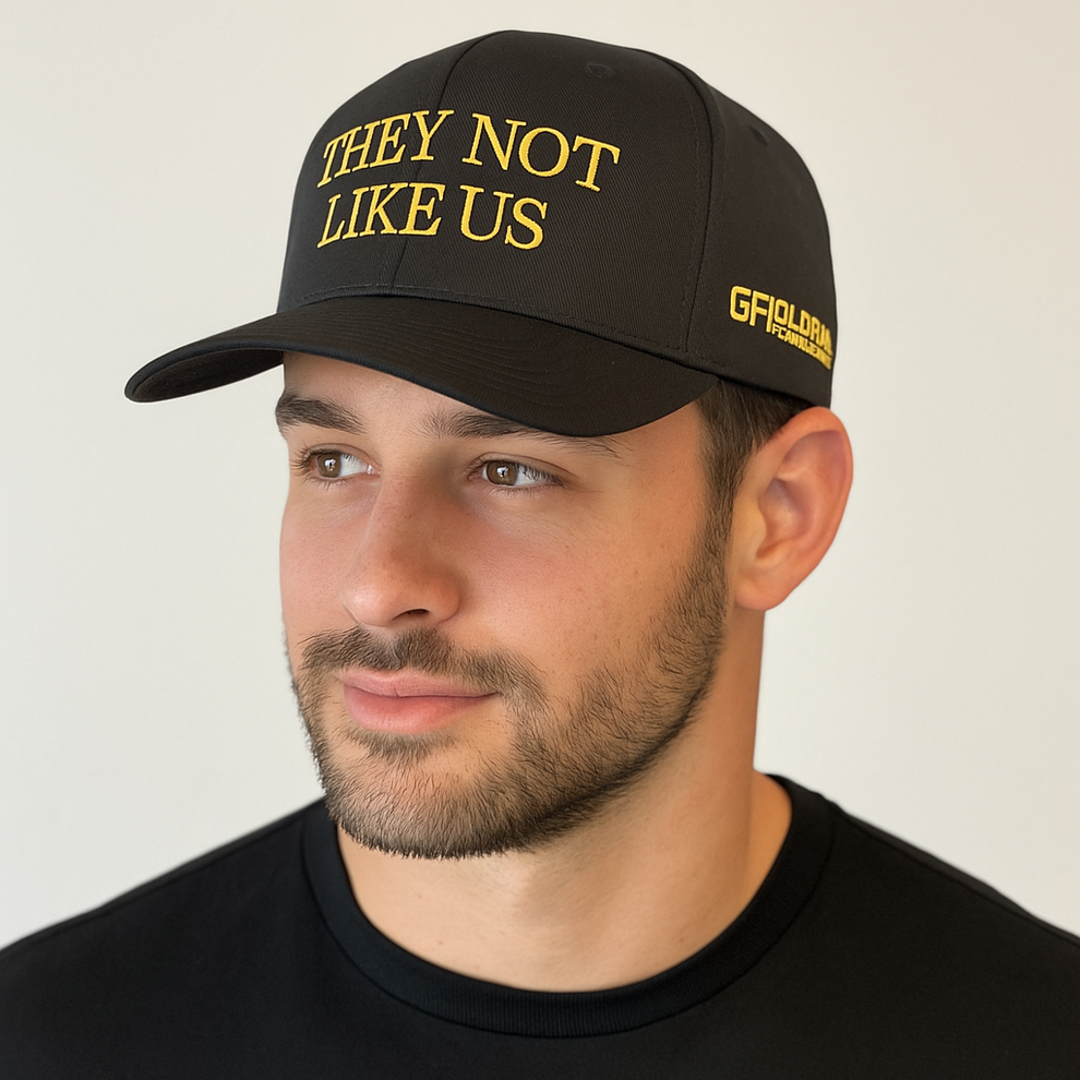 “THEY NOT LIKE US” GFI Hat – Black/Gold Edition – Inspired Apparel